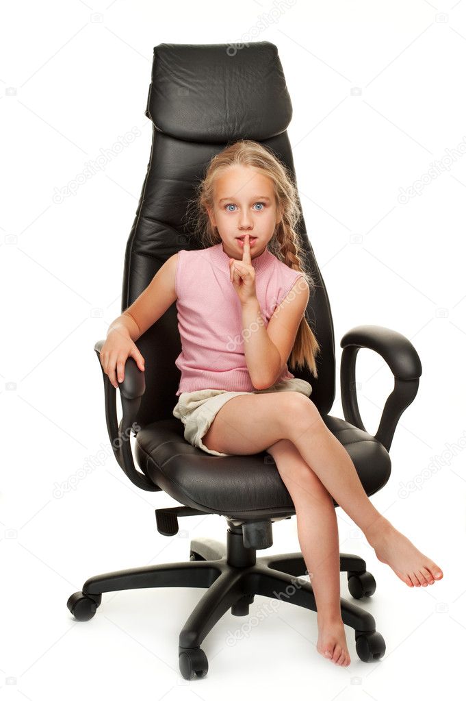Young girl sitting on a chair — Stock Photo © nejron #1421095