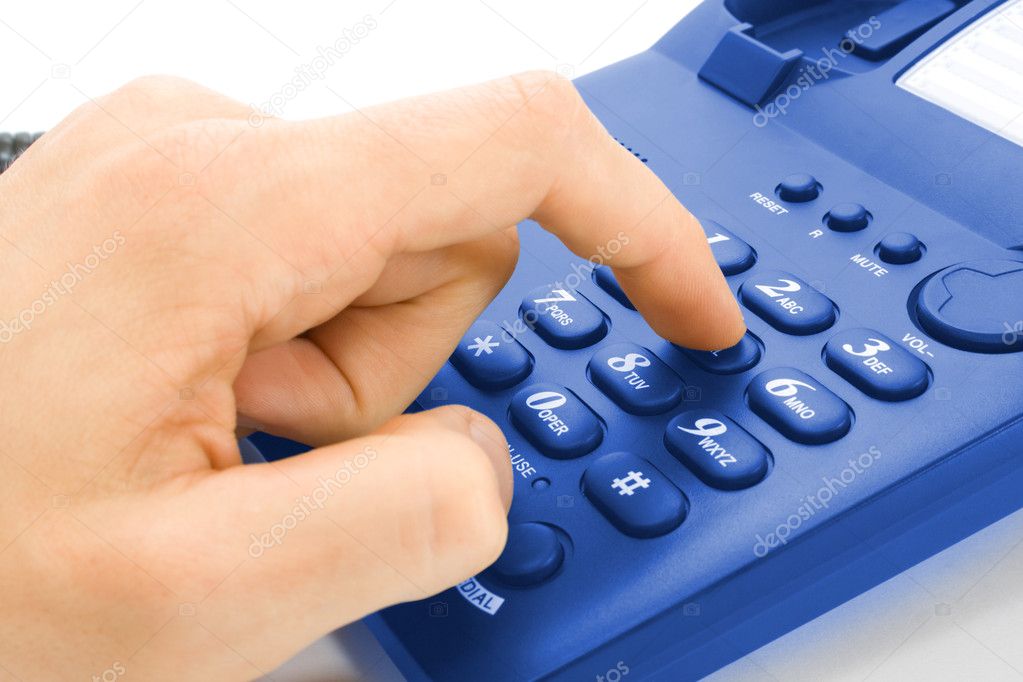 Fingers dialing number on telephone Stock Photo by Â©alexkalina 1036221
