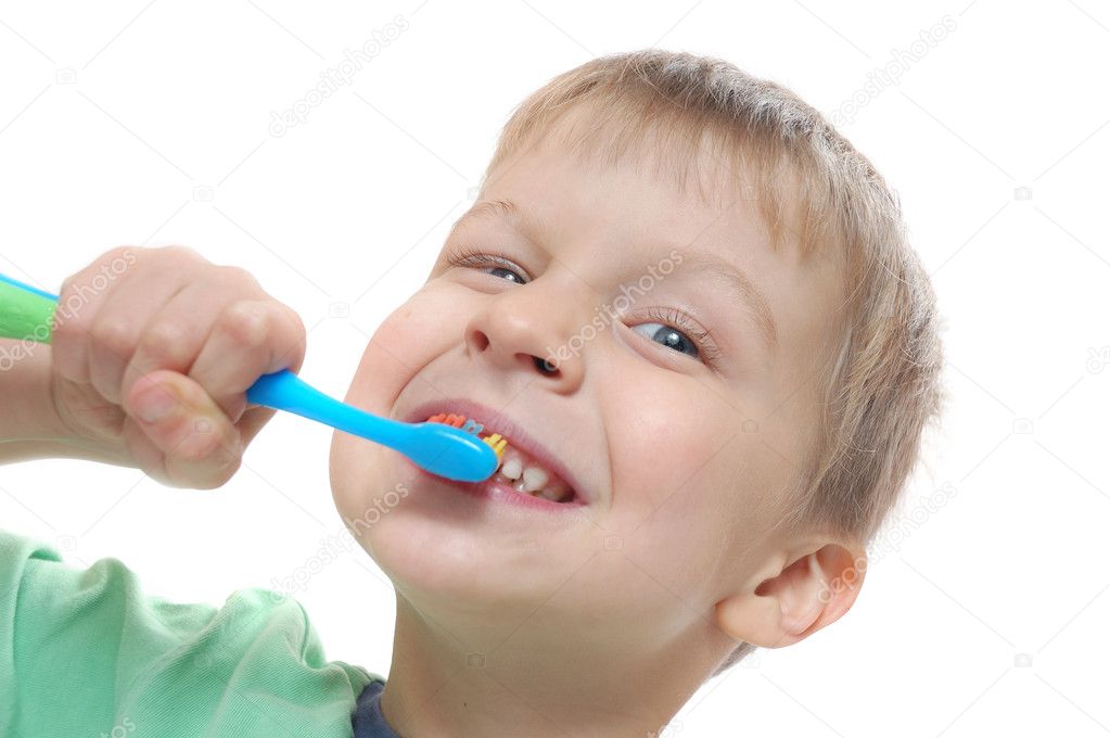 Child cleaning teeth Stock Photo by ©Cherry-Merry 1222198