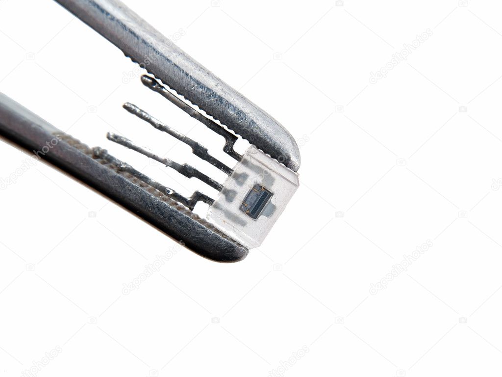 Optron in tweezers — Stock Photo © antony84 #1078664