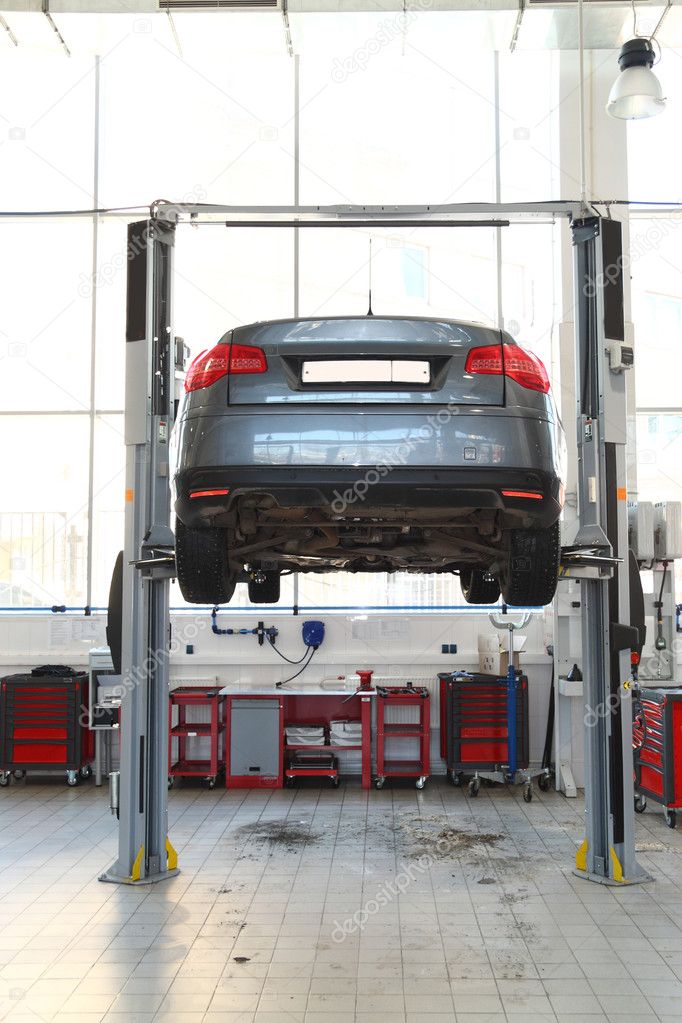 Car under repair Stock Photo by ©uatp12 1665844