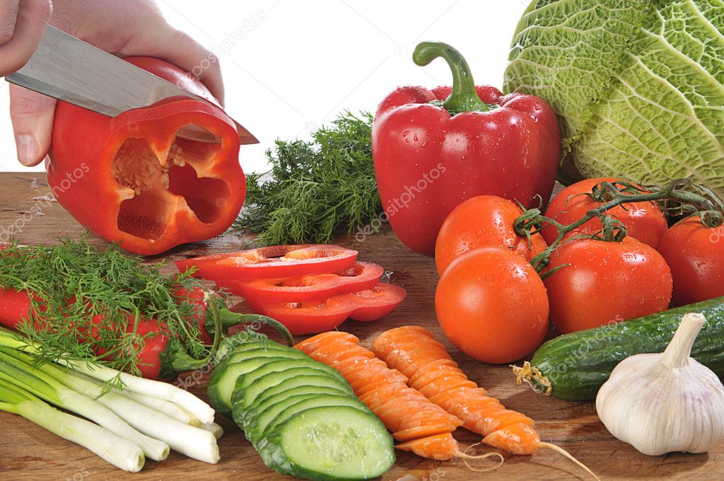 Hands cutting vegetables Stock Photo by ©dyoma2 2066936