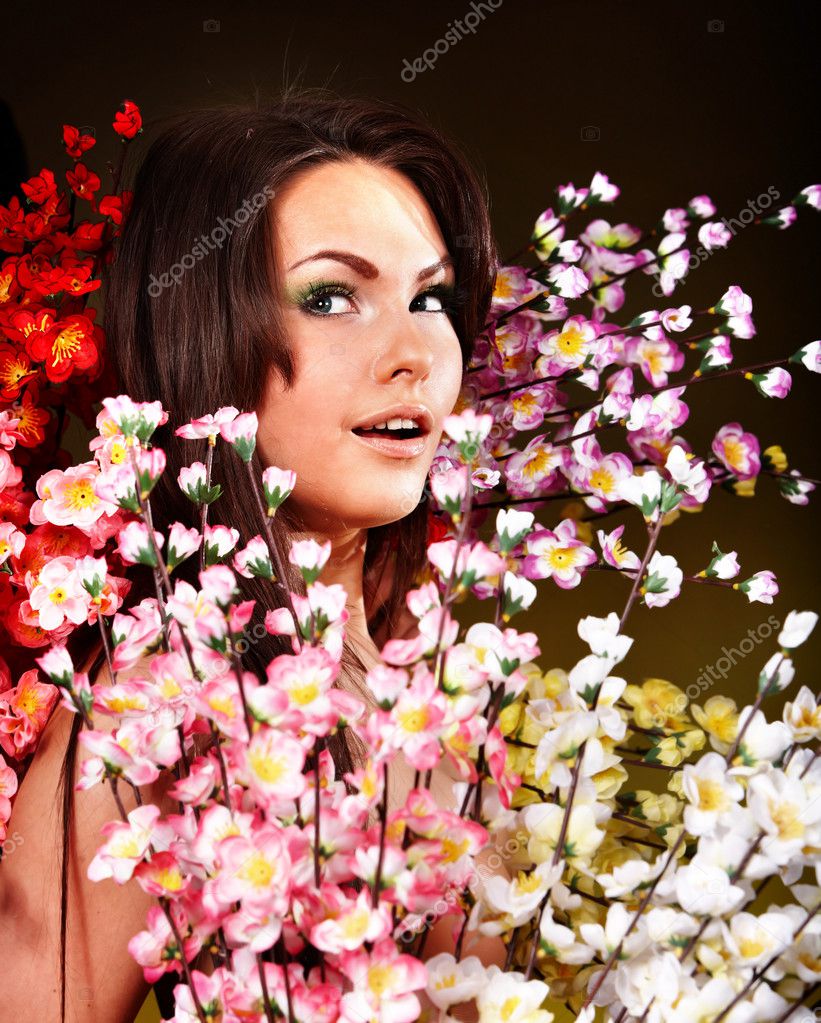 Young woman with group spring flower — Stock Photo © poznyakov #2336990