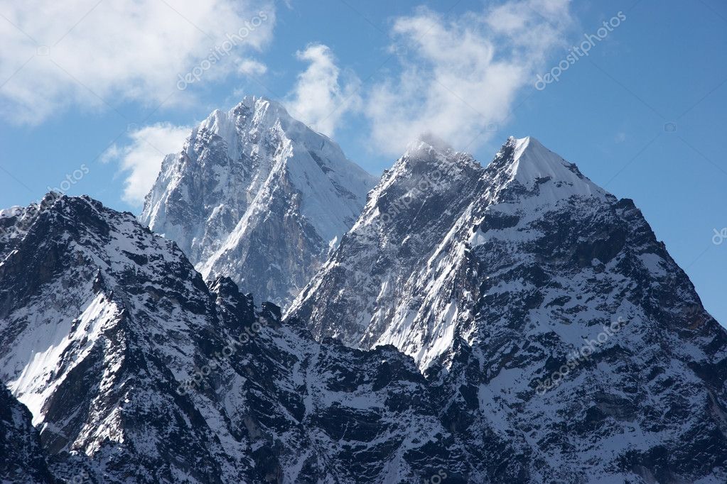 Impregnable rock summits covered with snow and ice, Himalaya, Nepal ...