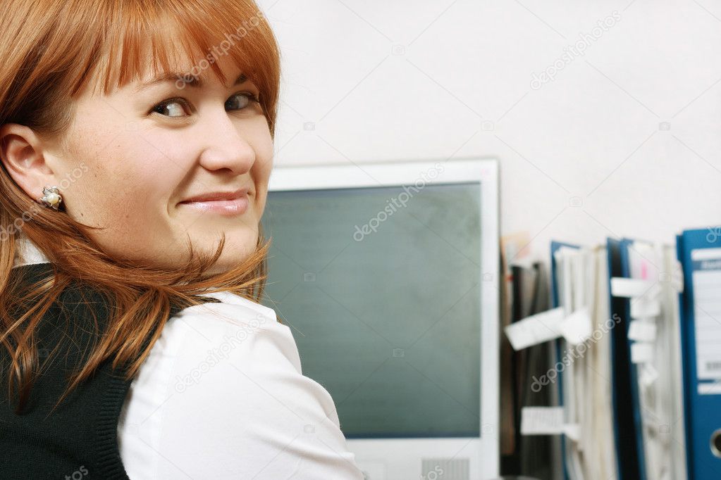 Woman in office smiling Stock Photo by ©jazzikov 1194750