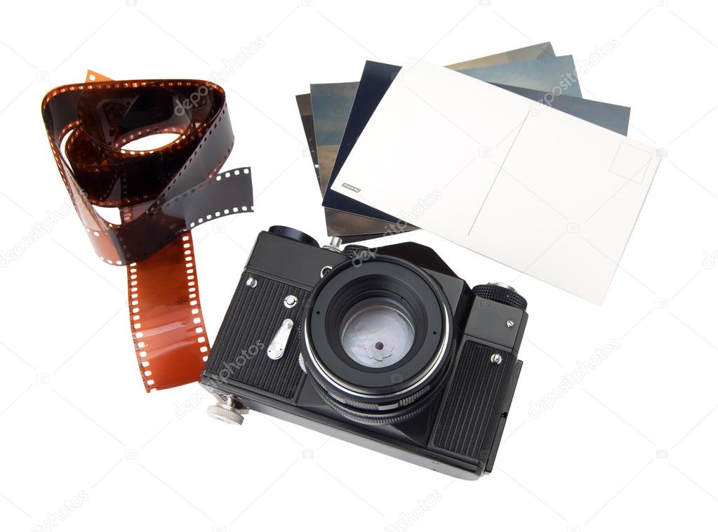 Old camera with photoes and negative — Stock Photo © silverkblack #1339681