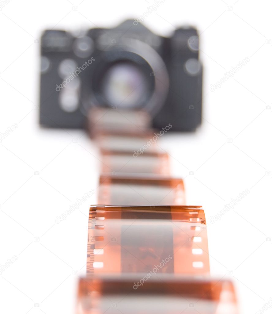 Film reel and old vintage camera — Stock Photo © silverkblack #1449728