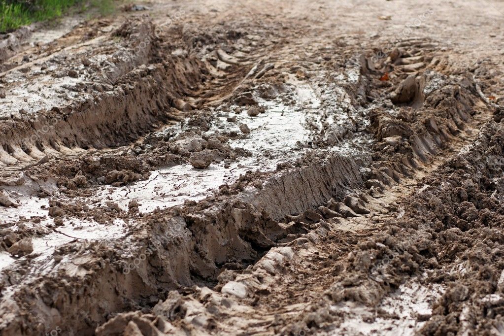 Closeup of car ruts in dry road mud — Stock Photo © slavapolo #1231658