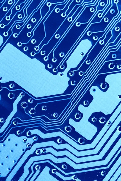 Blue circuit board close-up Stock Photo by ©Zoooom 1446192