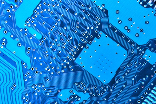 Blue circuit board close-up Stock Photo by ©Zoooom 1446192