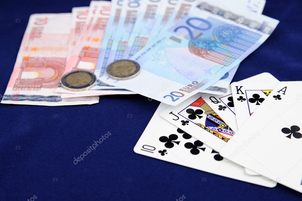 Playing cards with money Stock Photo by ©vincomfoto 1343009