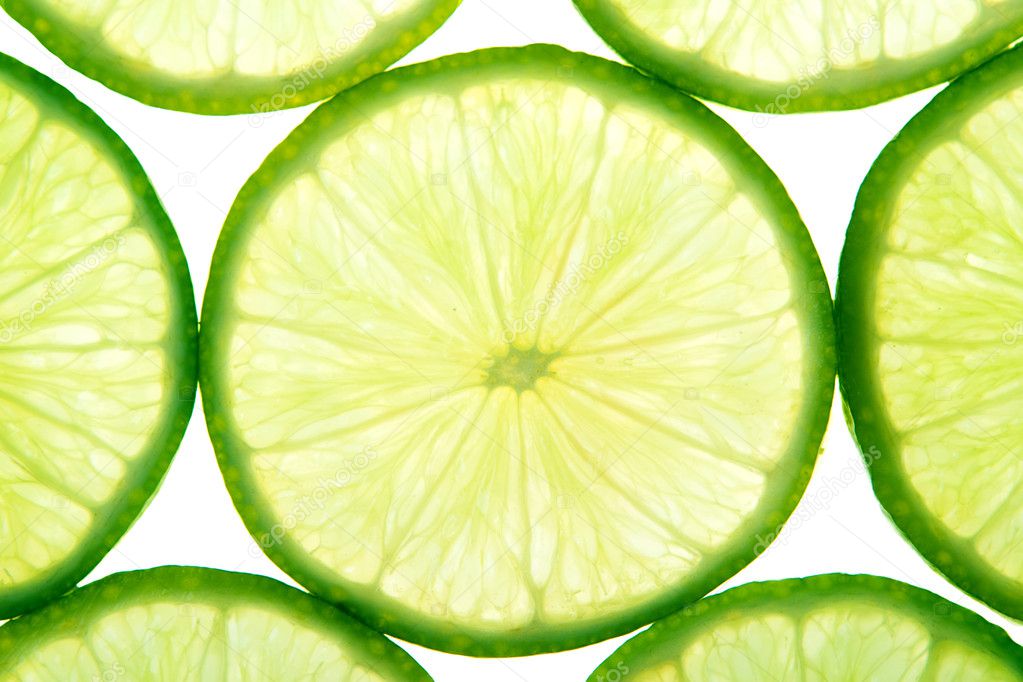 Green lime slices background Stock Photo by ©karandaev 1235699