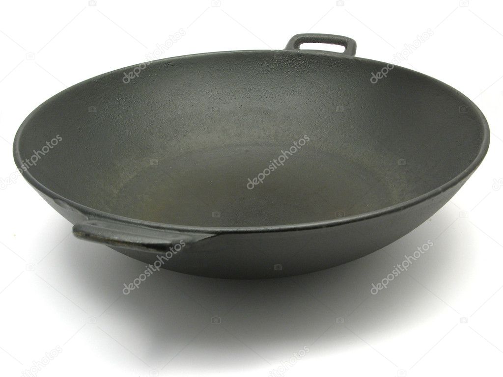 A big black wok for cooking on white Stock Photo by ©lantapix 1286303