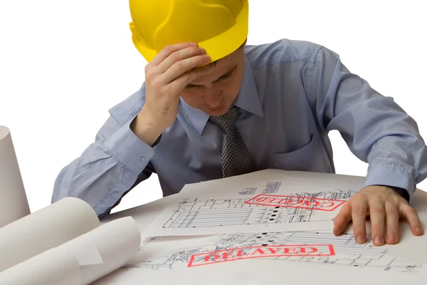 Sad architect with blueprints - Stock Image - Everypixel