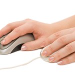 Hand holding mouse Stock Photo by ©mihhailov 5847411