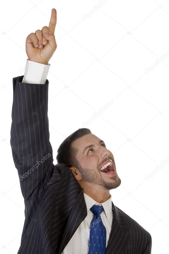 Happy businessman pointing upwards — Stock Photo © imagerymajestic #1366466 Happy businessman pointing upwards — Stock Photo © imagerymajestic #1366466