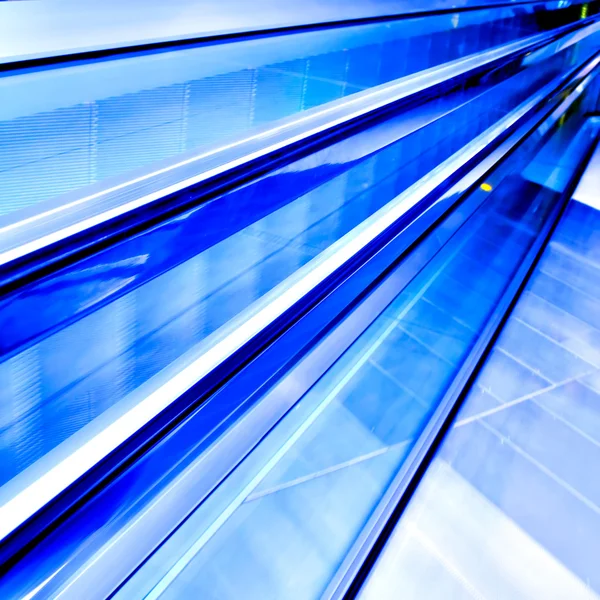 Moving escalator in the office hall - Stock Image - Everypixel