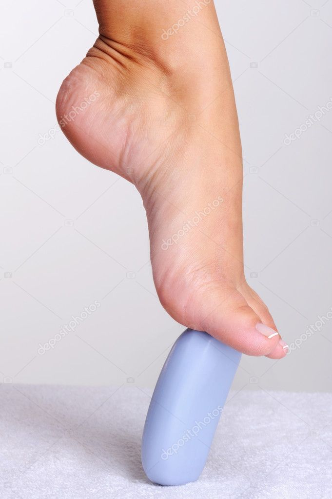 Female foot on a slice of soap Stock Photo by ©valuavitaly 1534479