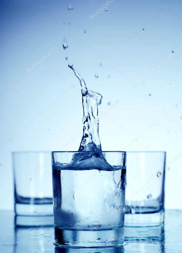 Water splash in a glass Stock Photo by ©jakegfx 1712985
