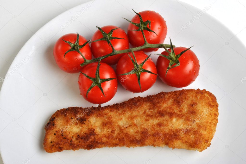 Deep fried fish and tomatoes Stock Photo by ©Szakaly 1539913