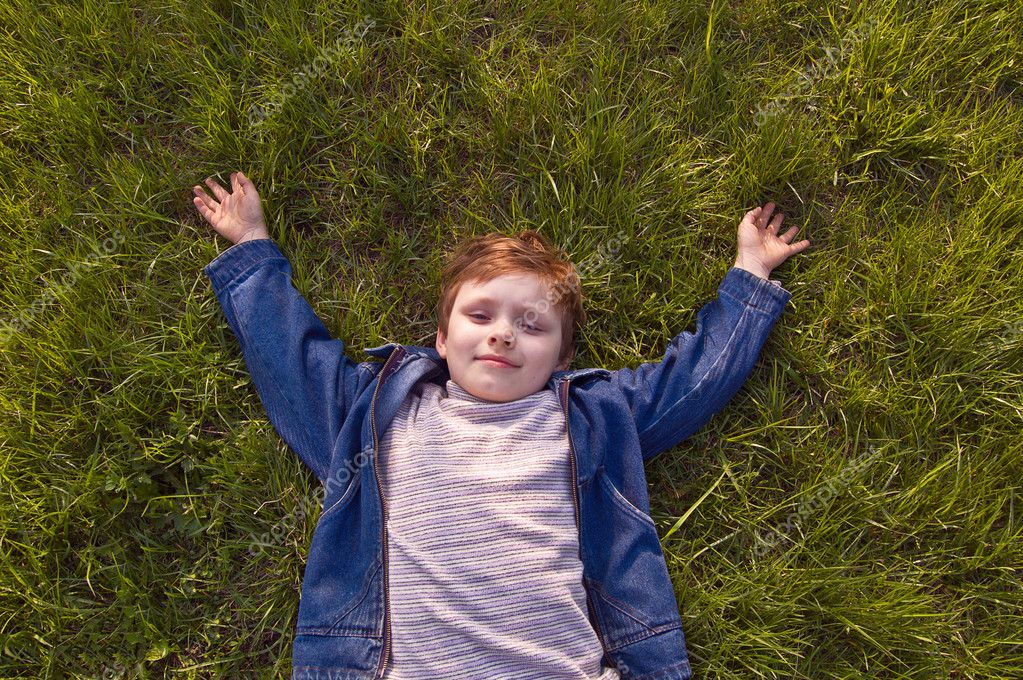 Boy on the grass Stock Photo by ©Iglira 1592940