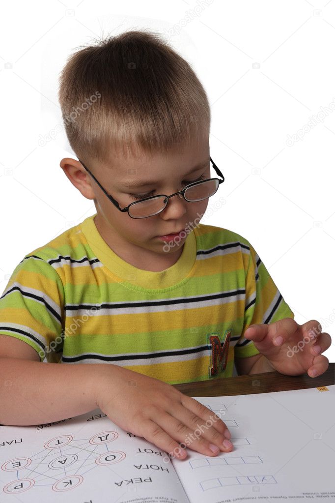 Young boy reading Stock Photo by ©Justaman 2479107