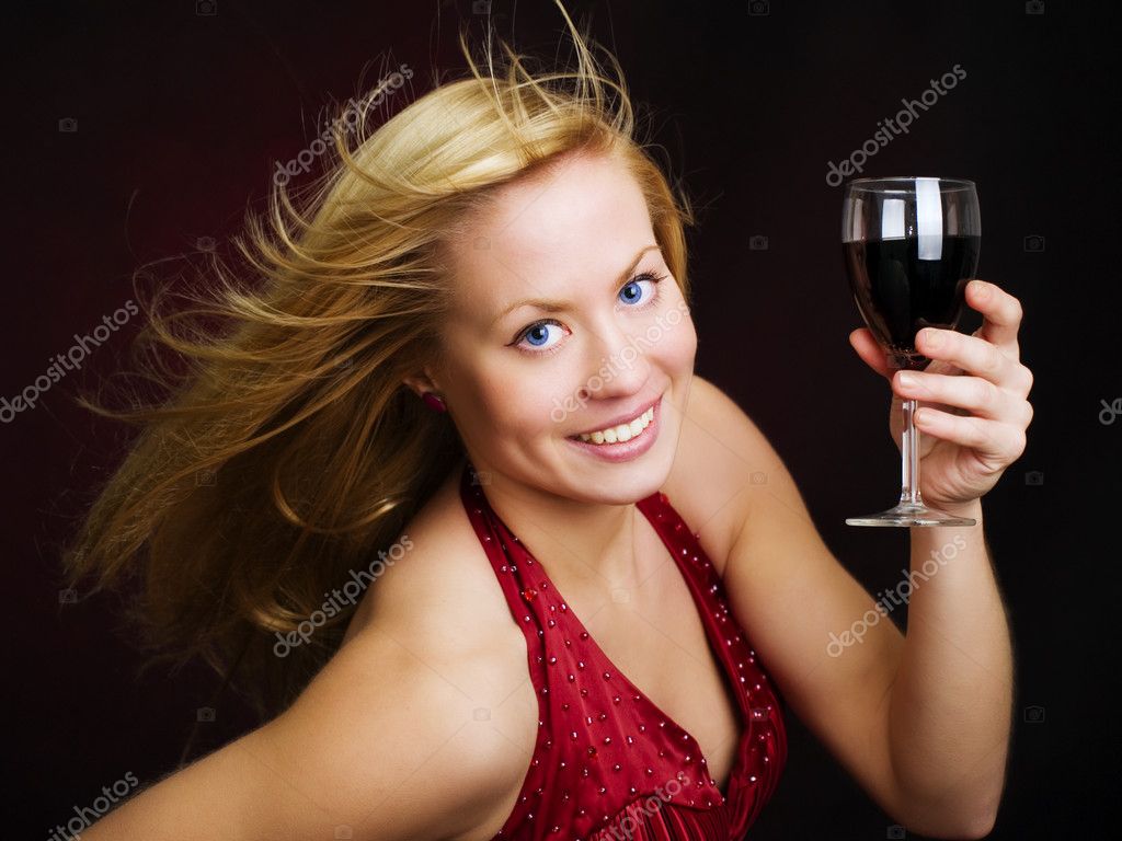 Smiling beautiful woman holding wine — Stock Photo © ayo888 #2094703 Smiling beautiful woman holding wine — Stock Photo © ayo888 #2094703