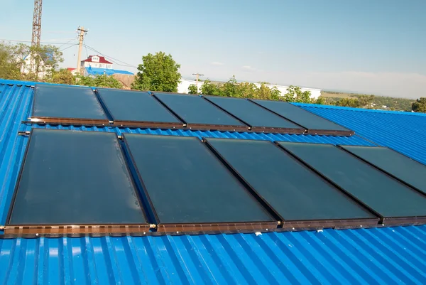 Solar water heating system Stock Photo by ©dovapi 1667741