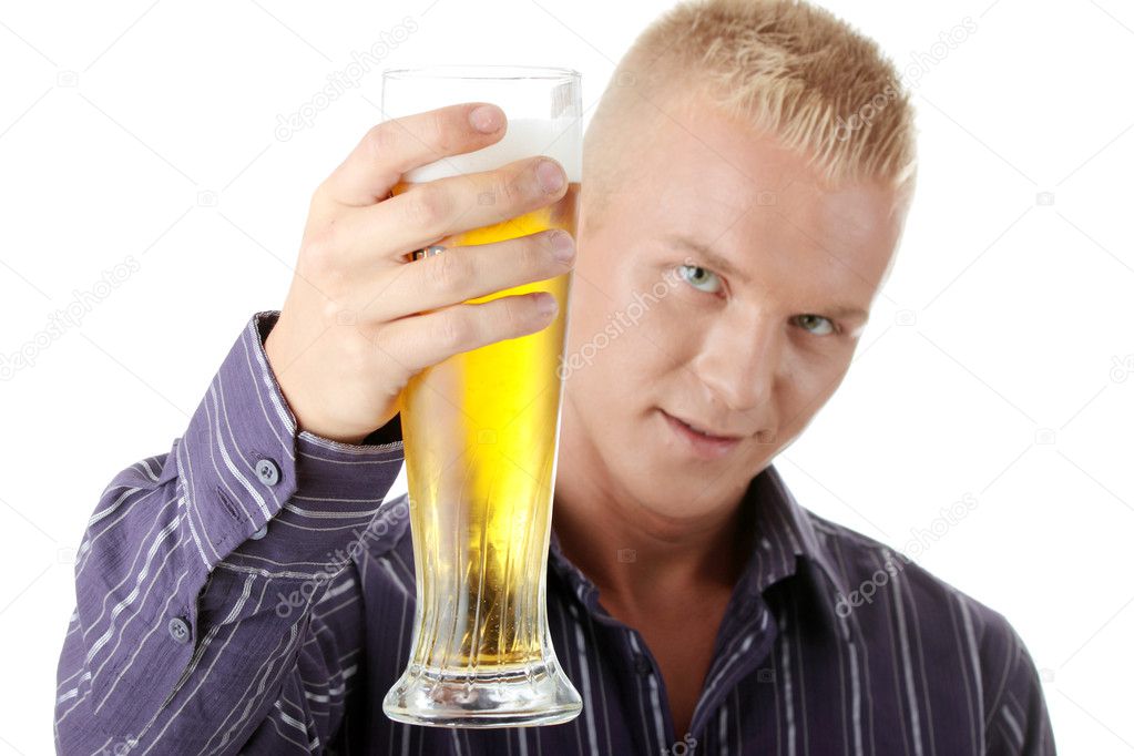 Happy young man holding a glass of beer — Stock Photo © piotr_marcinski ...