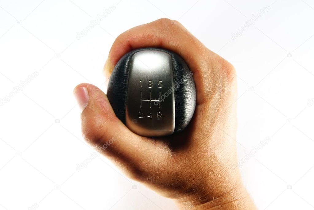 Gear lever in hand Stock Photo by ©Kishano 2055348