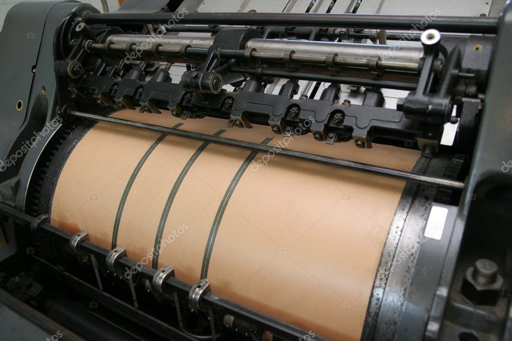 Printing machine Stock Photo by ©vladacanon 2554537