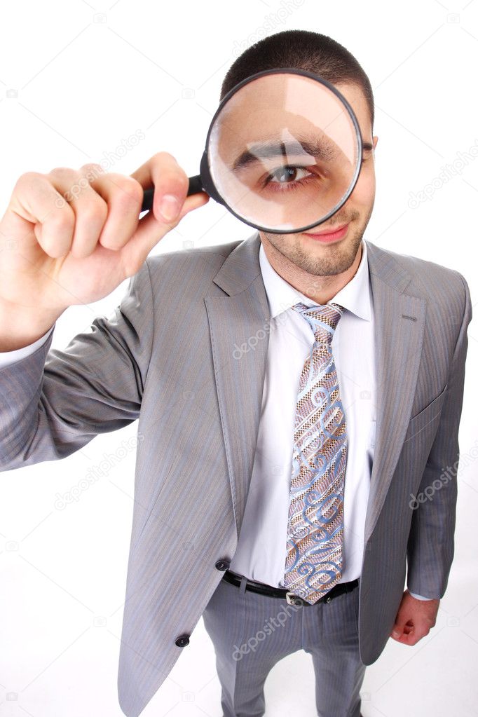 Man with magnifying glass — Stock Photo © Dmitroza #2498786