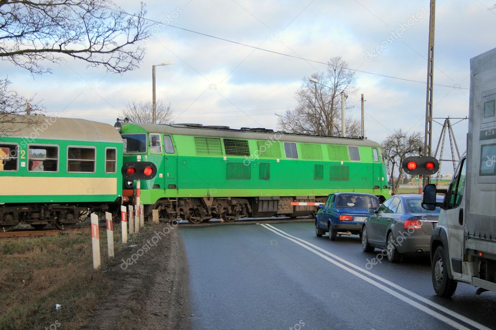 Railroad crossing with passing train — Stock Photo © remik44992 #1974325