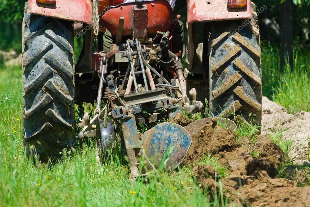 Tractor plowing — Stock Photo © Xalanx #2255269 Tractor plowing — Stock Photo © Xalanx #2255269