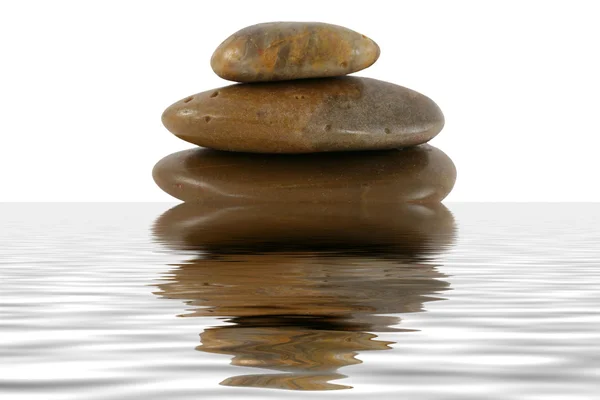 Stack of zen rocks with water reflection - Stock Image - Everypixel