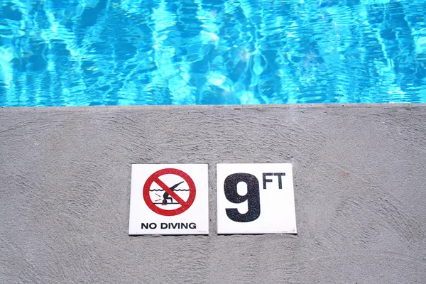Swimming pool depth marker — Stock Photo © njnightsky #2119920 Swimming pool depth marker — Stock Photo © njnightsky #2119920