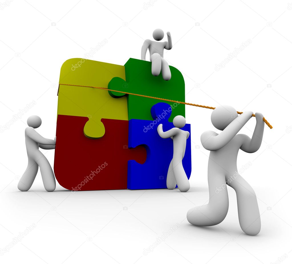 Equipo poniendo rompecabezas juntos — Foto de stock © iqoncept #2076877