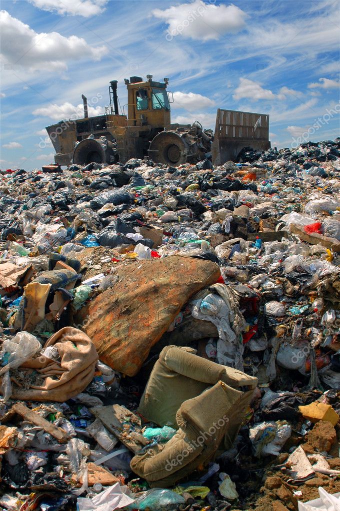 The bulldozer on a garbage dump — Stock Photo © sergioz #2073426