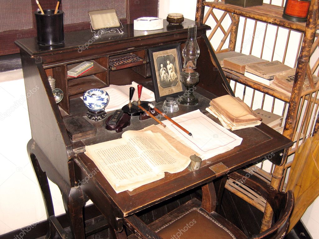 Old table with miscellaneous objects Stock Photo by ©ensiferum 2477183