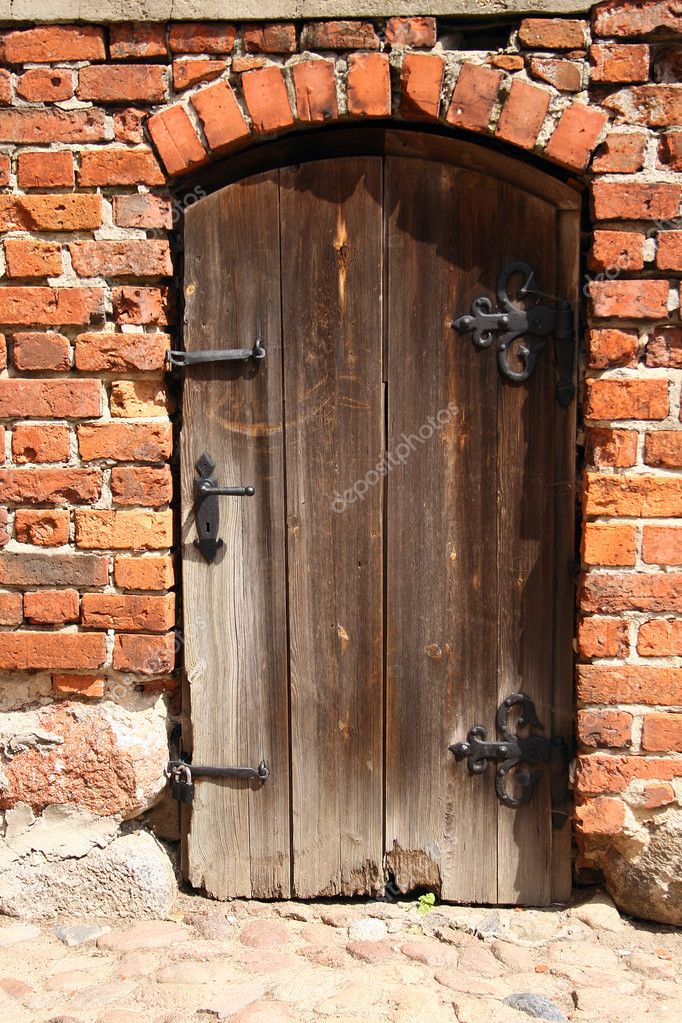 An old, rotten door in a brick wall — Stock Photo © halina_photo #2316301