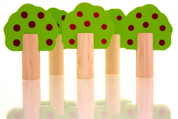 Three wooden toy trees — Stock Photo © mreco99 #2715393