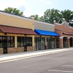 New Strip Mall Stock Photo by ©EyeMark 2561504
